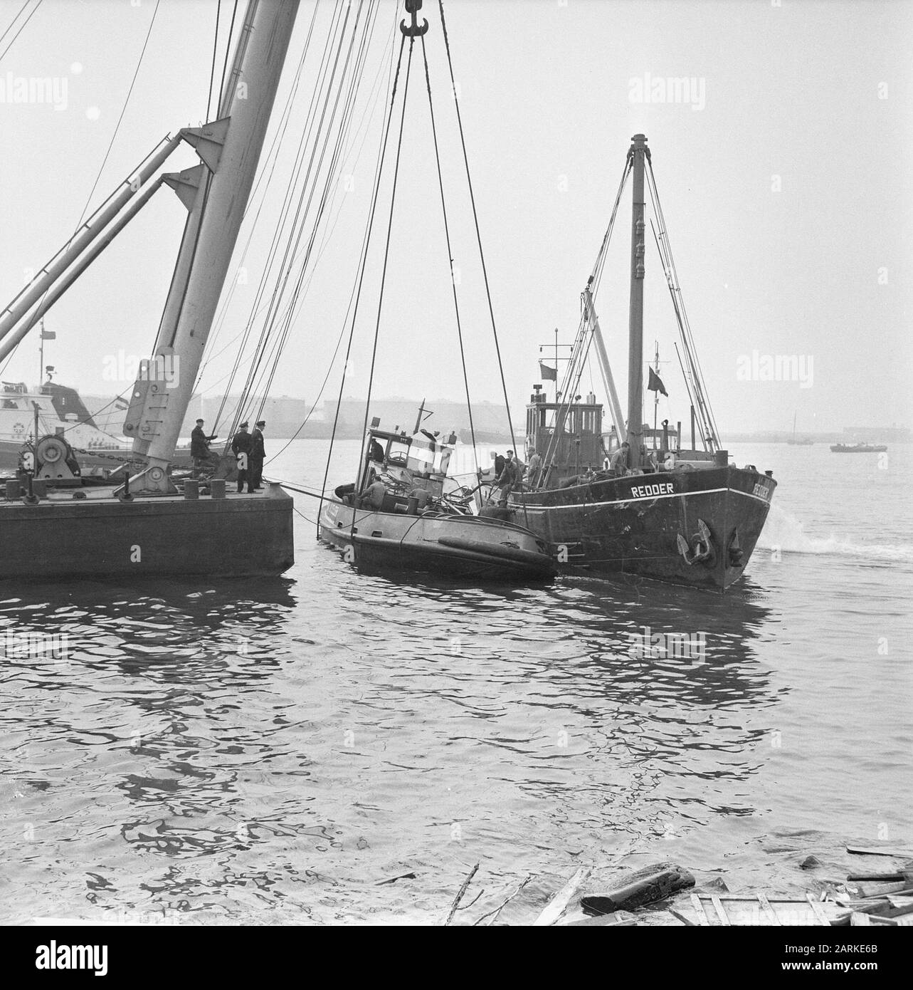 Tug boat sailing in North Sea Canal. Salvage work Annotation: Left a ...