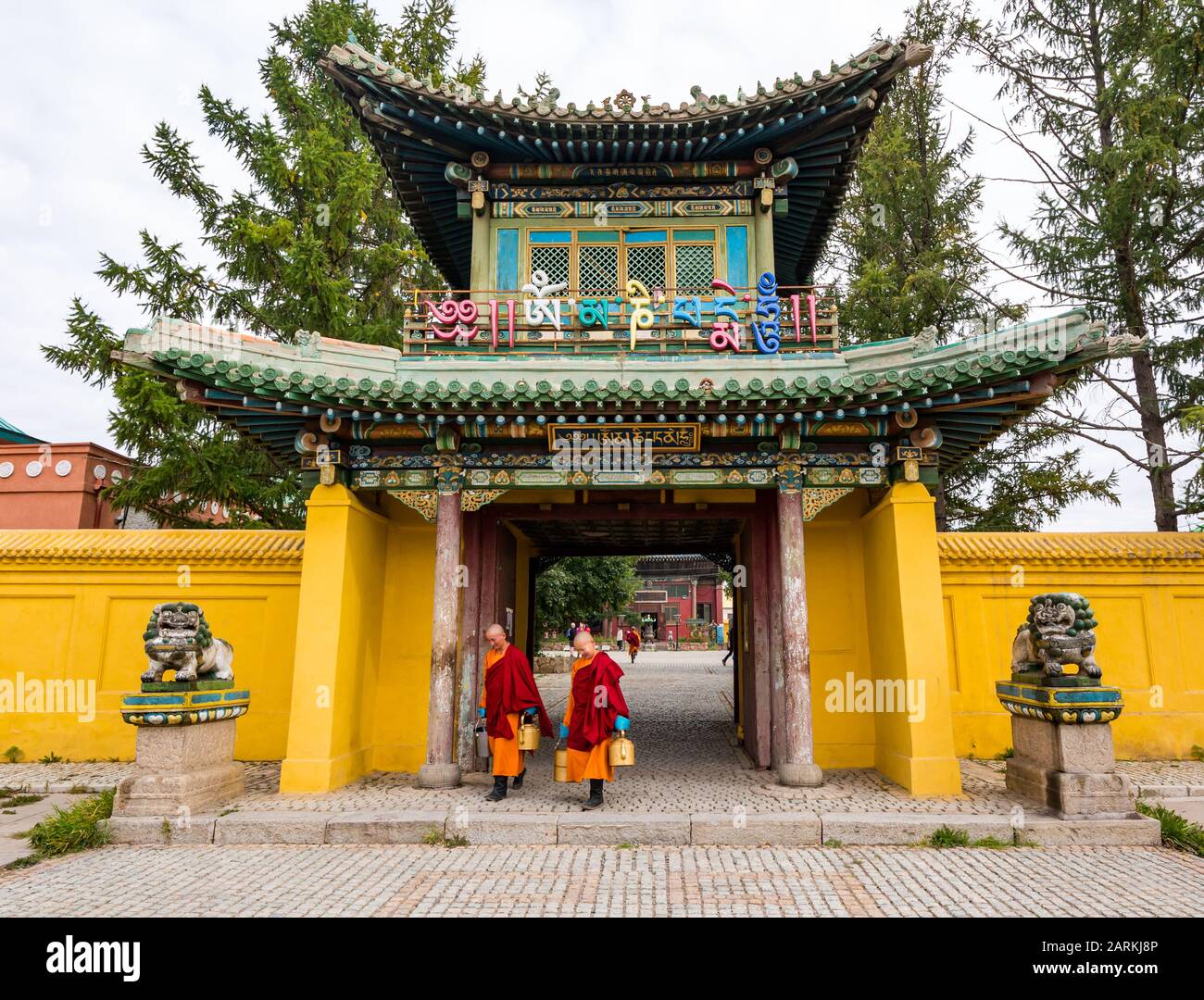 Buddhist monks at entrance gateway, Gandan Monastery, Ulaanbaatar ...