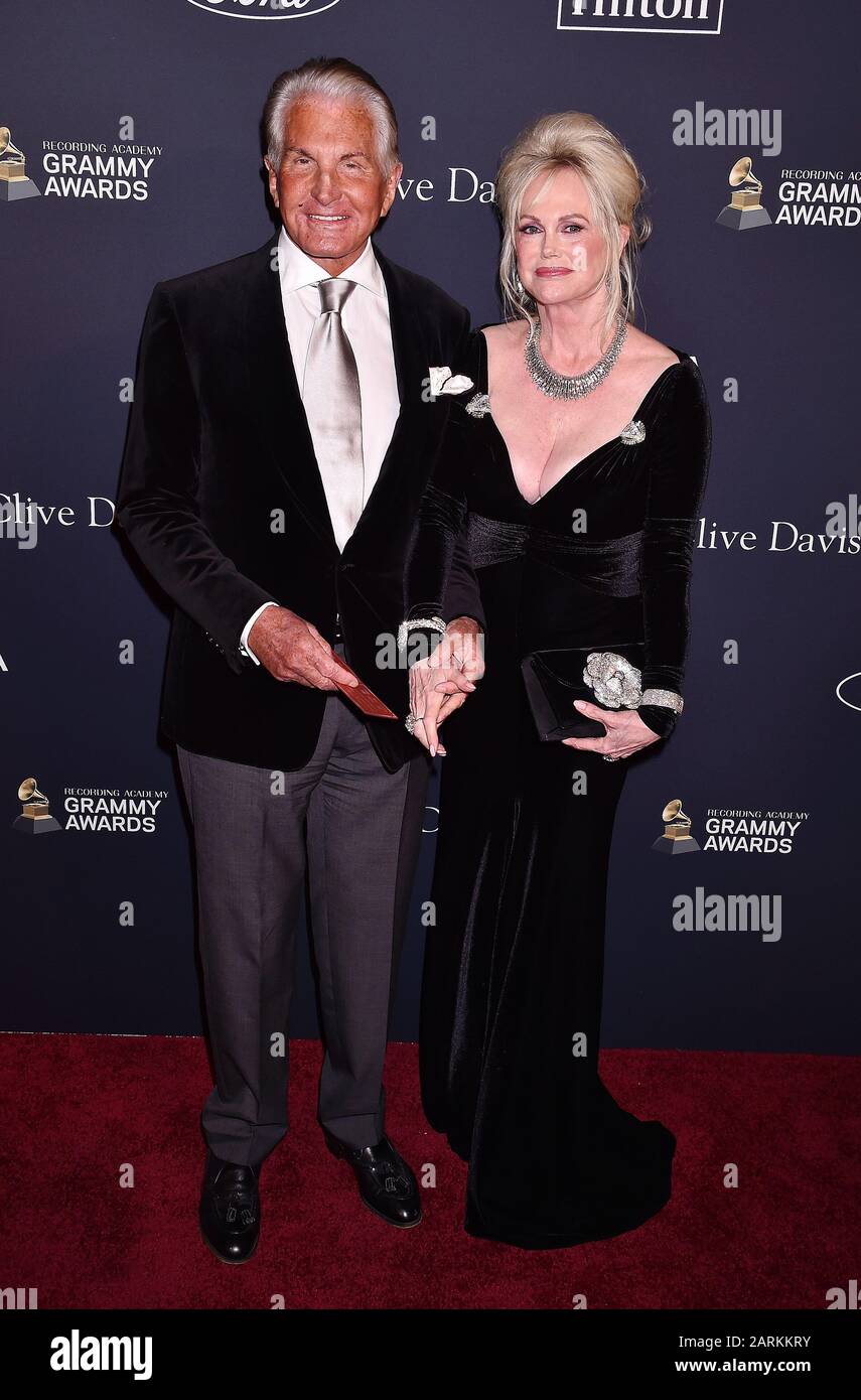 BEVERLY HILLS, CA - JANUARY 25: George Hamilton and Kelly Day attend ...