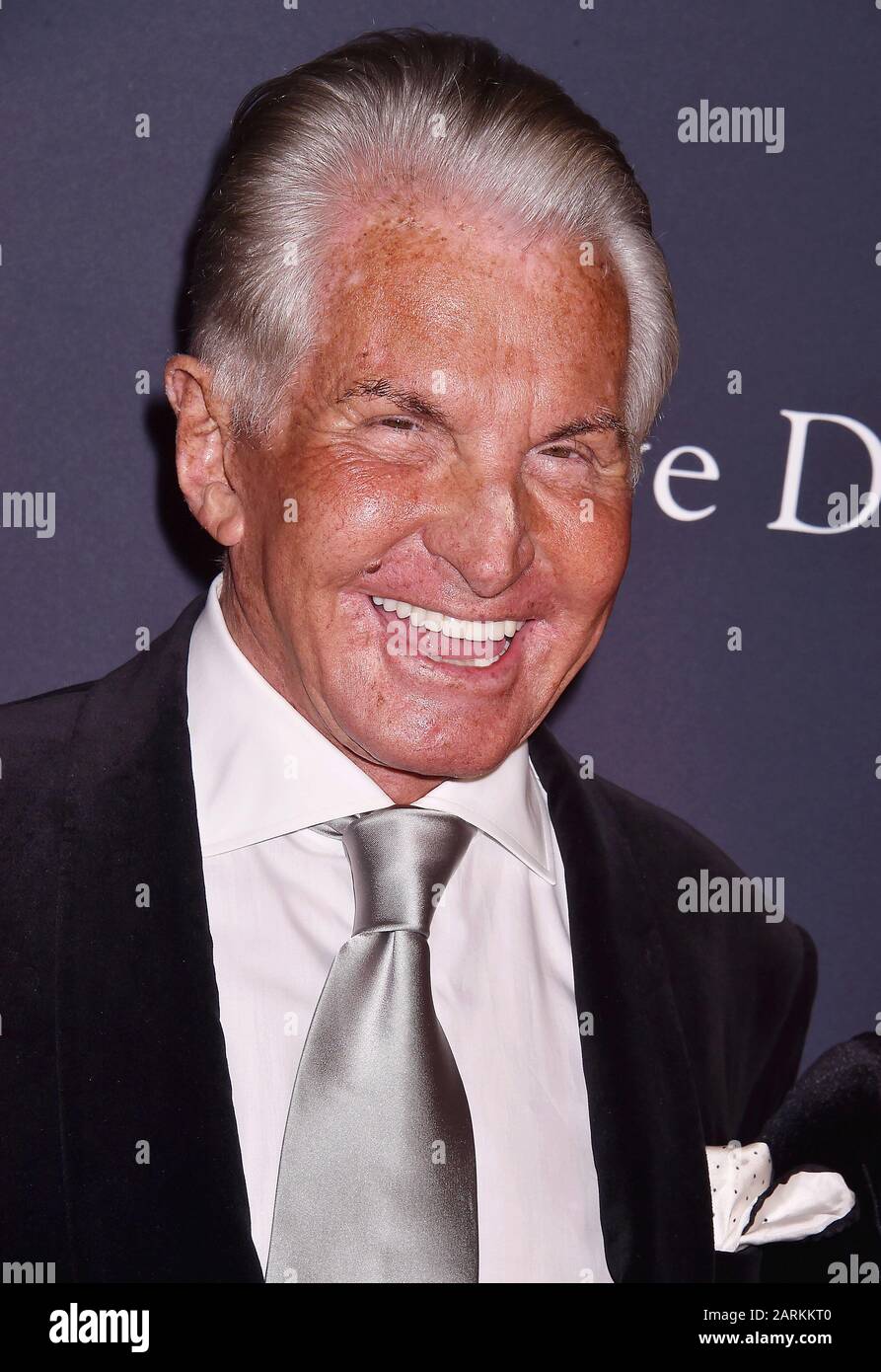 BEVERLY HILLS, CA - JANUARY 25: George Hamilton attends the Pre-GRAMMY ...