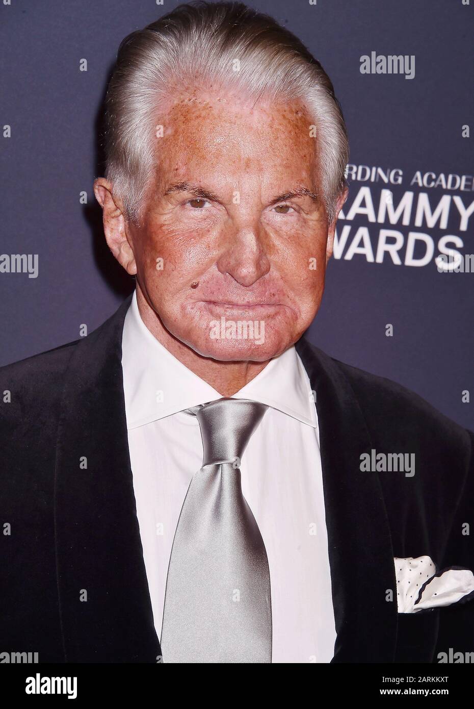 BEVERLY HILLS, CA - JANUARY 25: George Hamilton attends the Pre-GRAMMY ...