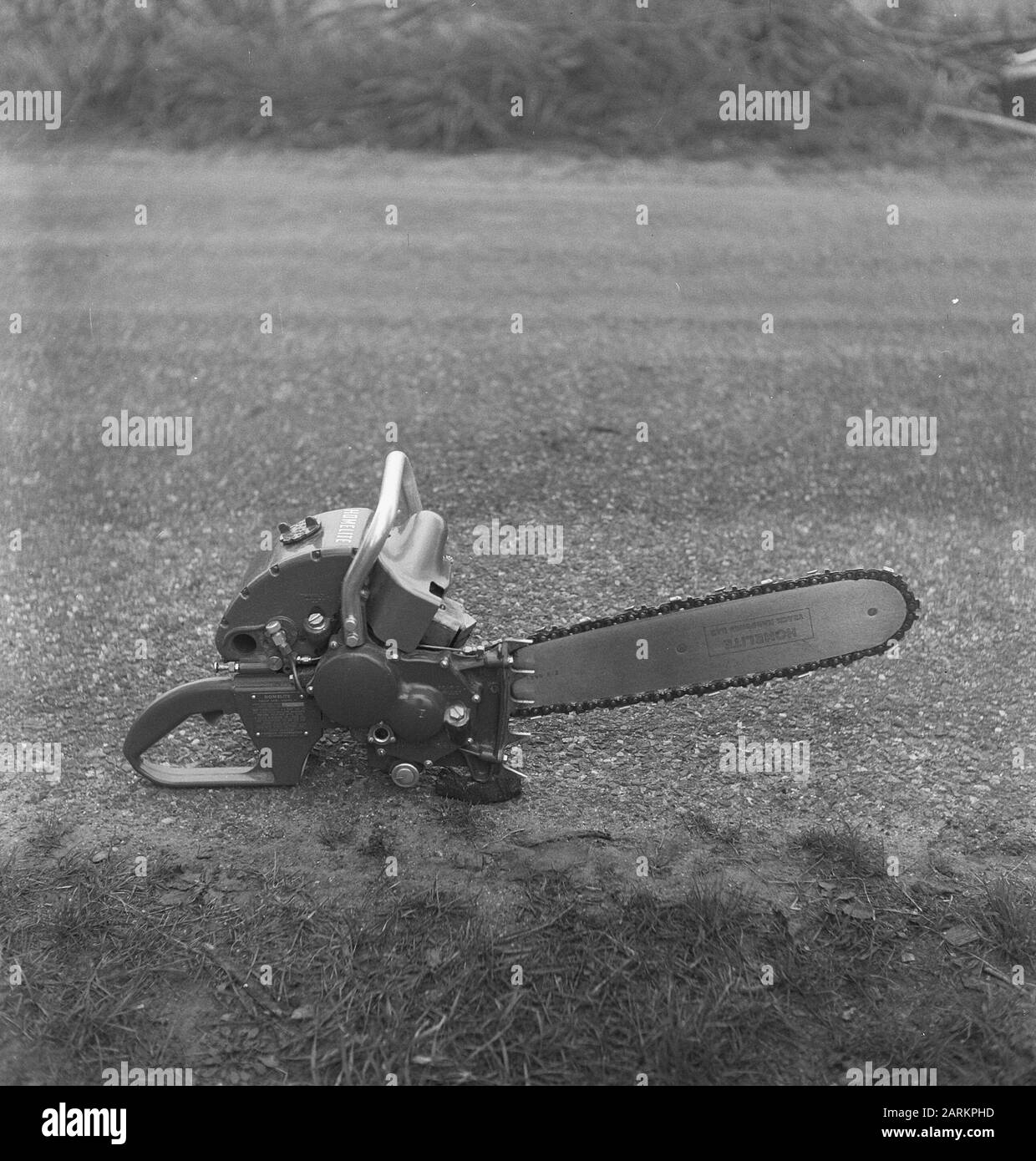 Hand saw person Black and White Stock Photos & Images - Alamy