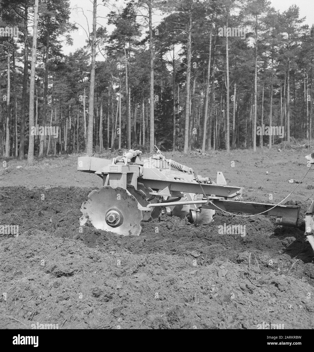 Tillage agricultural machinery work Black and White Stock Photos ...