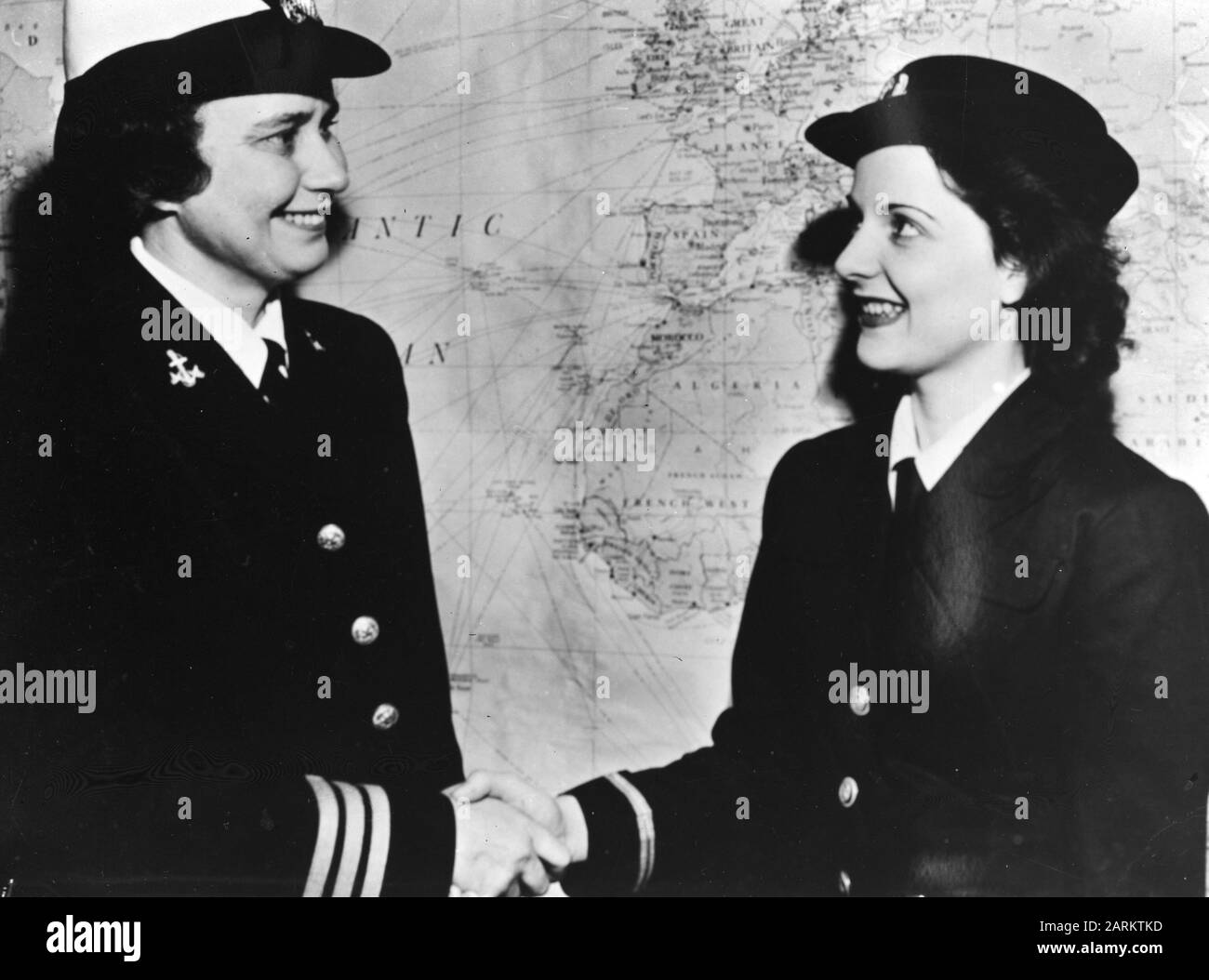 An American WAVE greets a French colleague Date: 1945 Keywords: Second ...