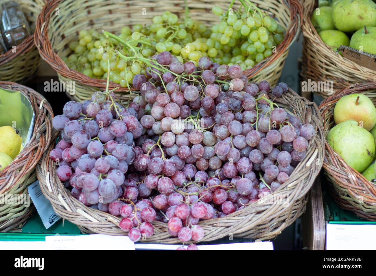 Fruit grape on the greengrocer counter. Bench on the pavement Stock ...