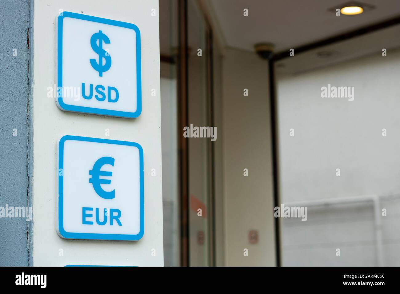 Dollar and euro signs. Written in blue on white signboard Stock Photo ...