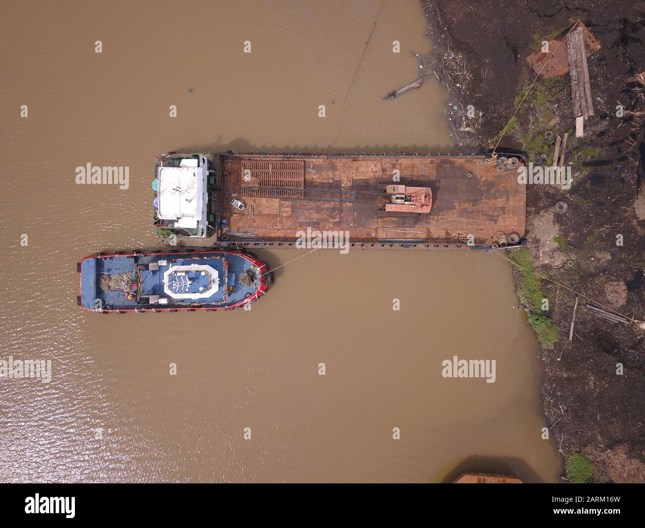 Aerial view of a barrage at the Kuching Isthmus island, with ships ...