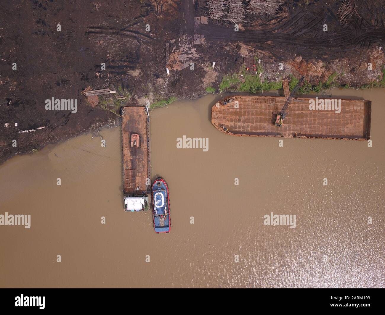 Aerial view of a barrage at the Kuching Isthmus island, with ships ...