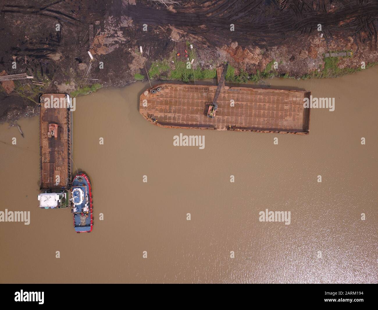 Aerial view of a barrage at the Kuching Isthmus island, with ships ...