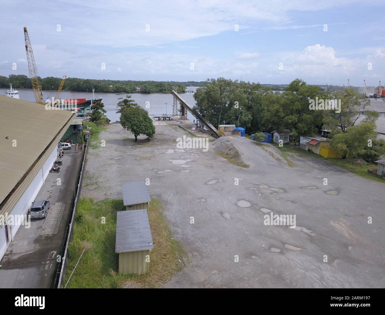 Aerial view of a barrage at the Kuching Isthmus island, with ships ...