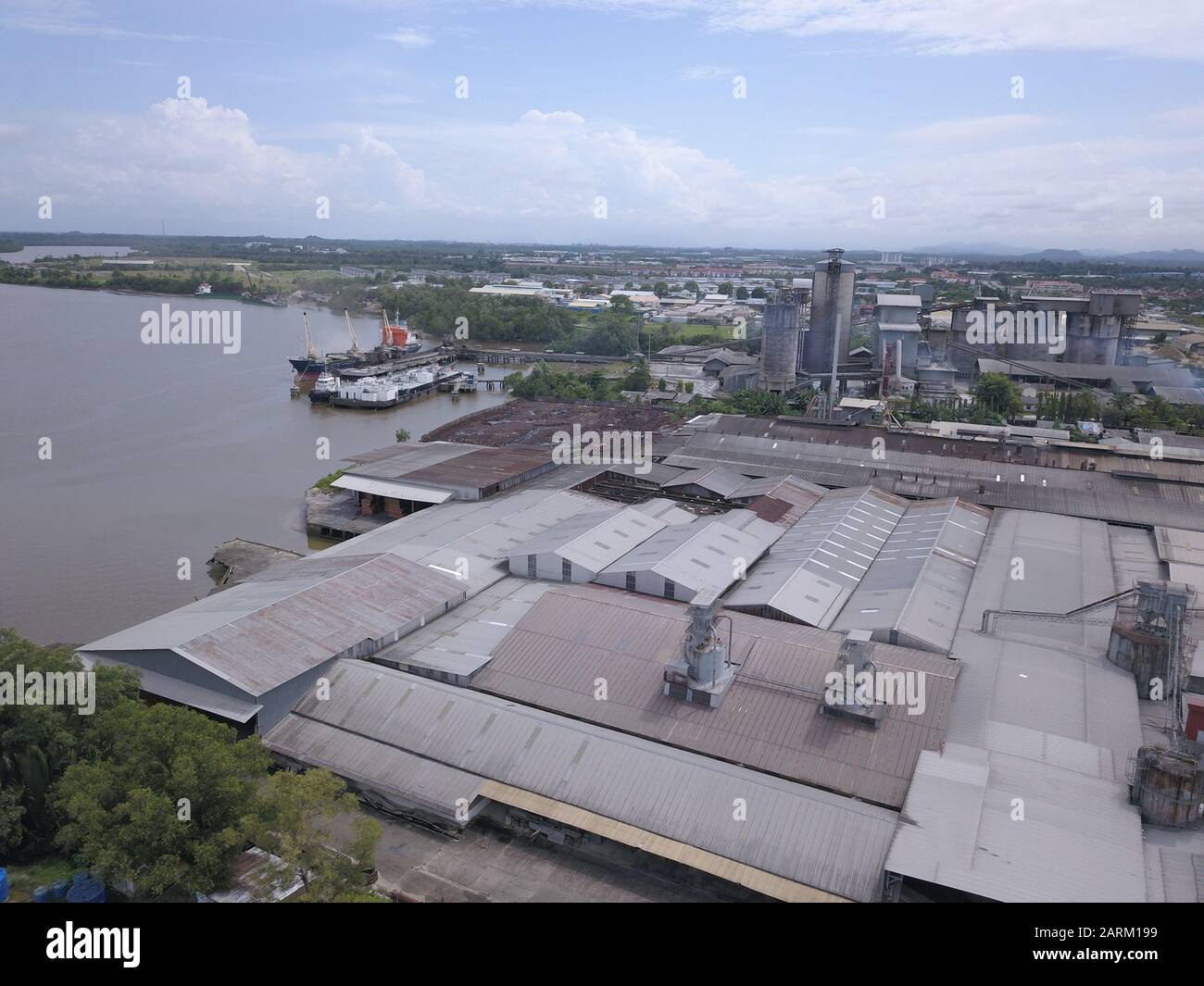 Aerial view of a barrage at the Kuching Isthmus island, with ships ...