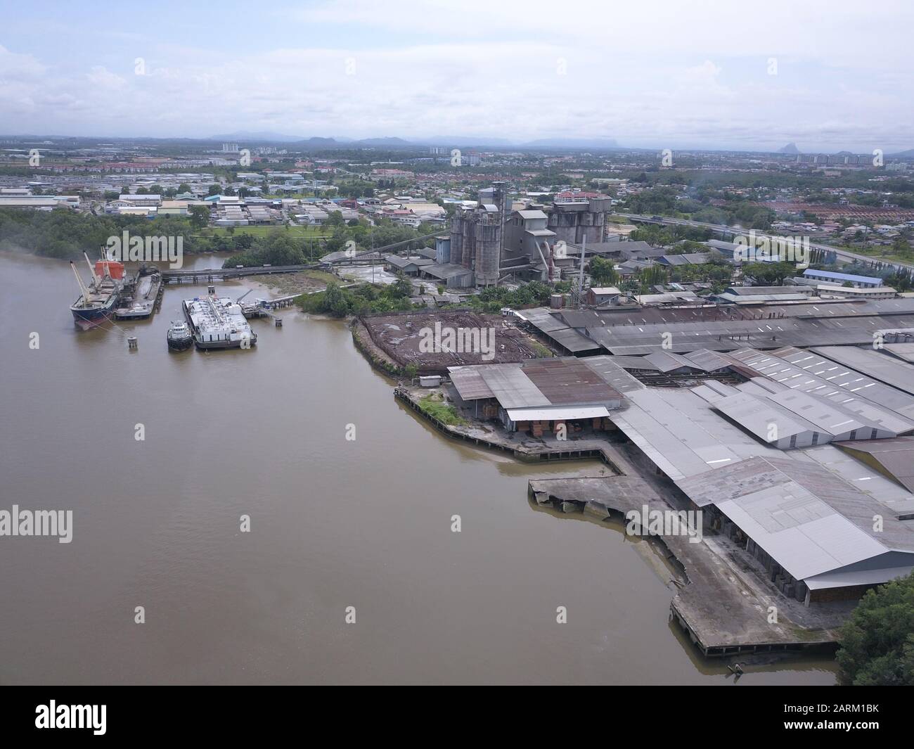 Aerial view of a barrage at the Kuching Isthmus island, with ships ...