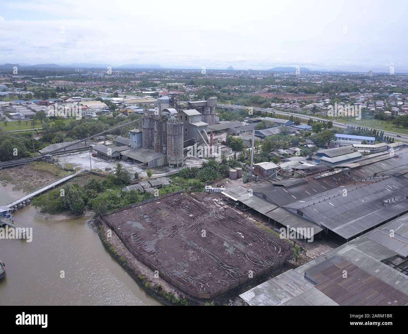 Aerial view of a barrage at the Kuching Isthmus island, with ships ...