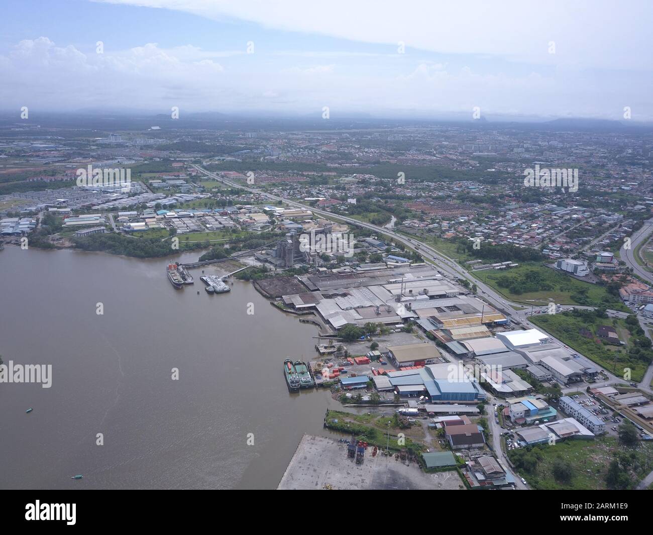Aerial view of a barrage at the Kuching Isthmus island, with ships ...