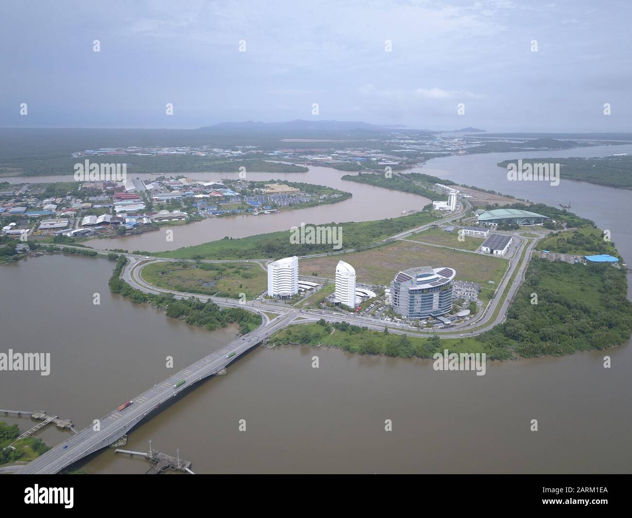 Aerial view of a barrage at the Kuching Isthmus island, with ships ...
