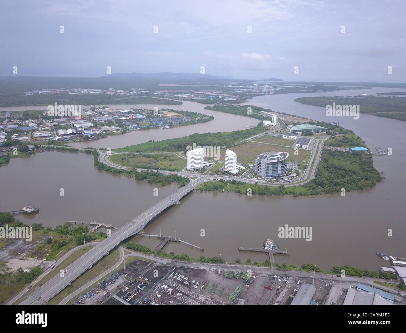 Aerial view of a barrage at the Kuching Isthmus island, with ships ...