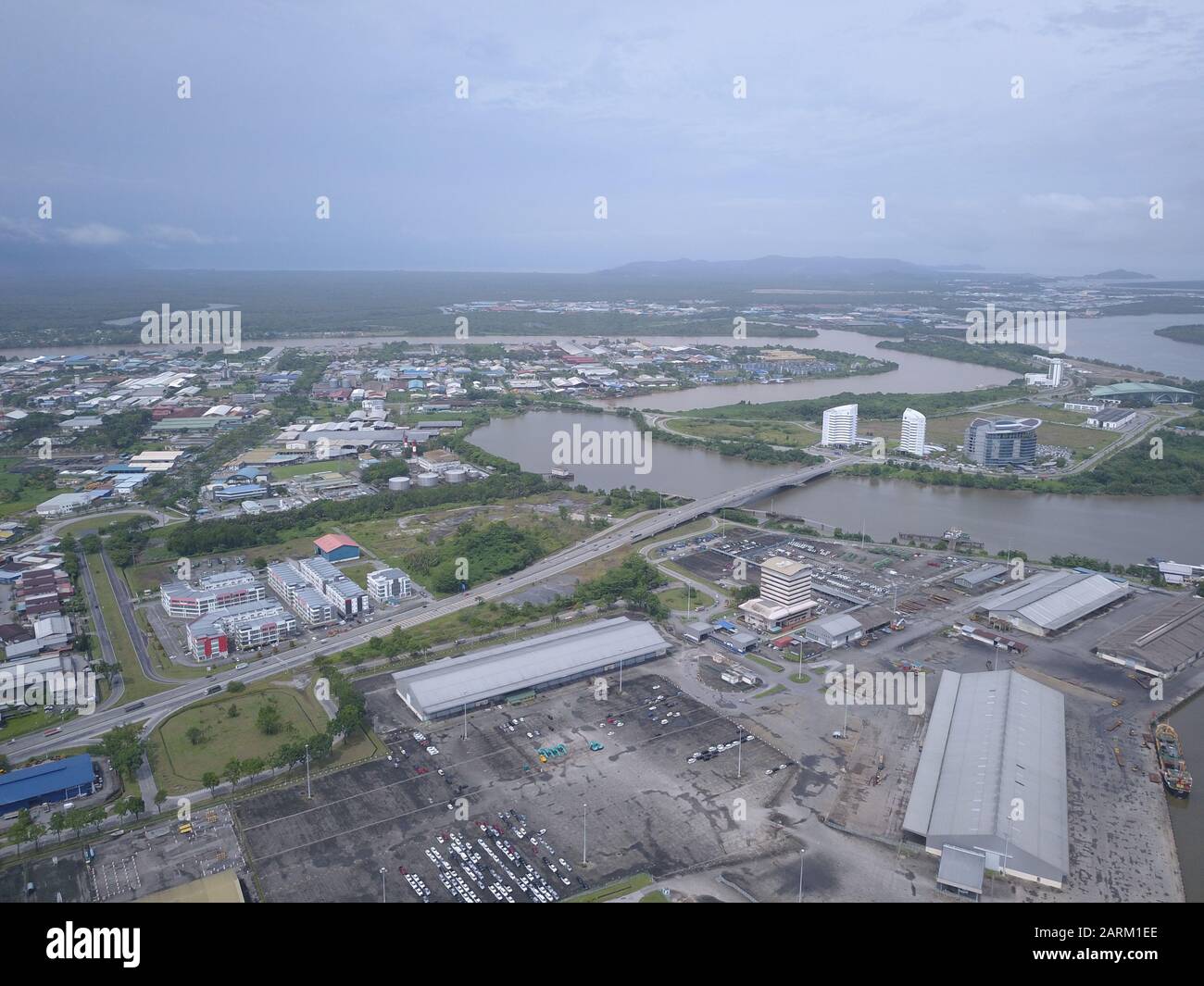 Aerial view of a barrage at the Kuching Isthmus island, with ships ...