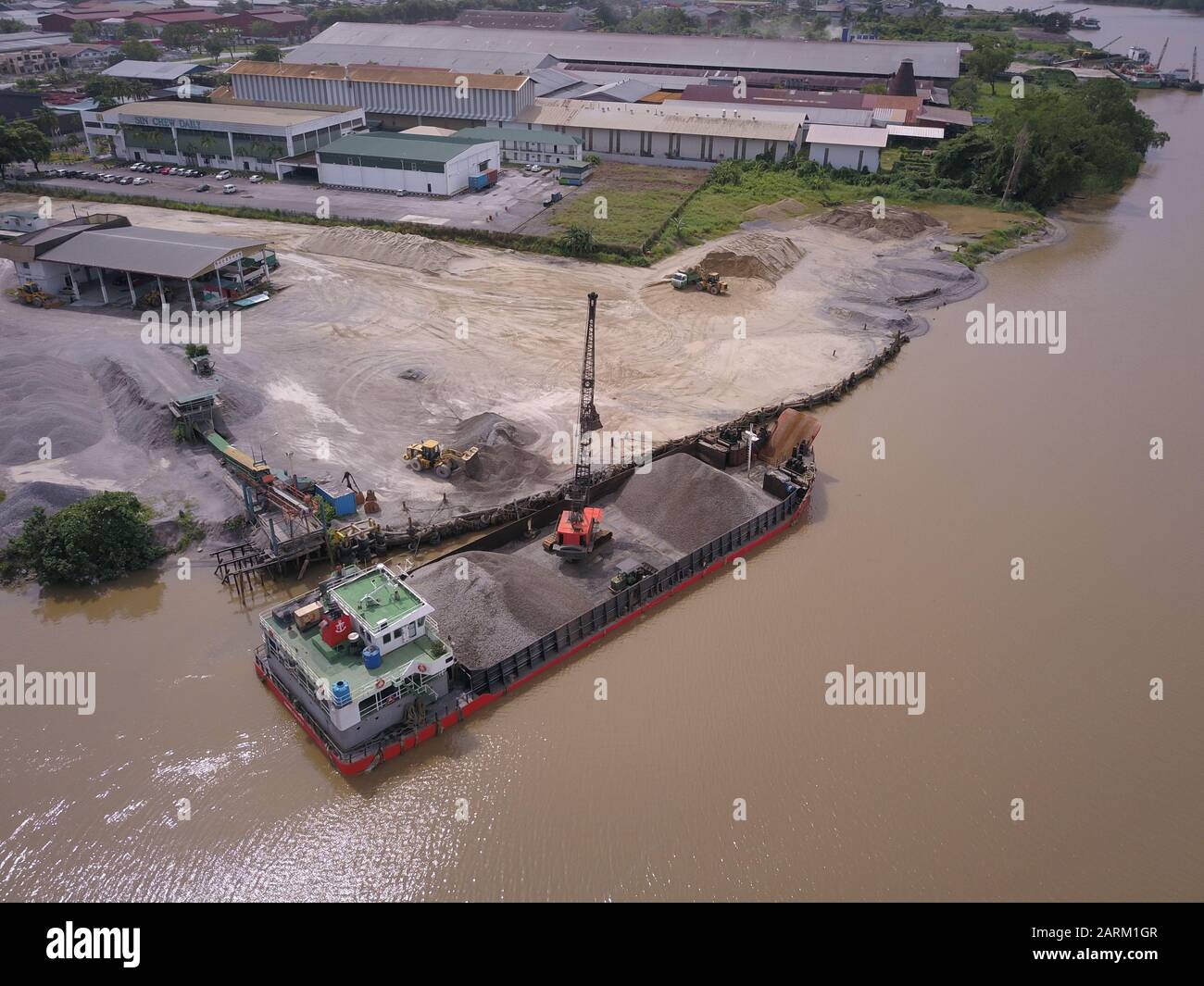 Aerial view of a barrage at the Kuching Isthmus island, with ships ...