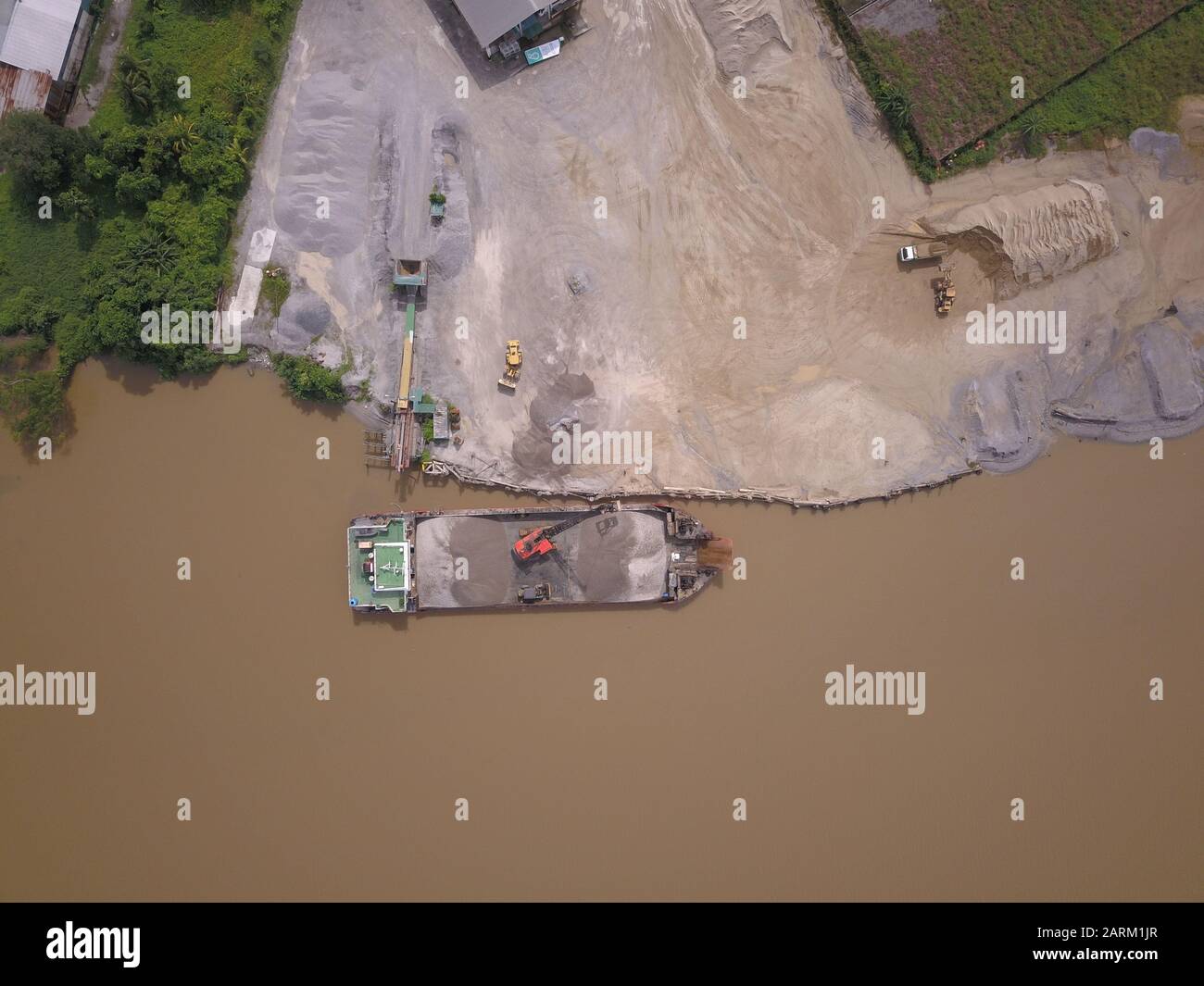 Aerial view of a barrage at the Kuching Isthmus island, with ships ...