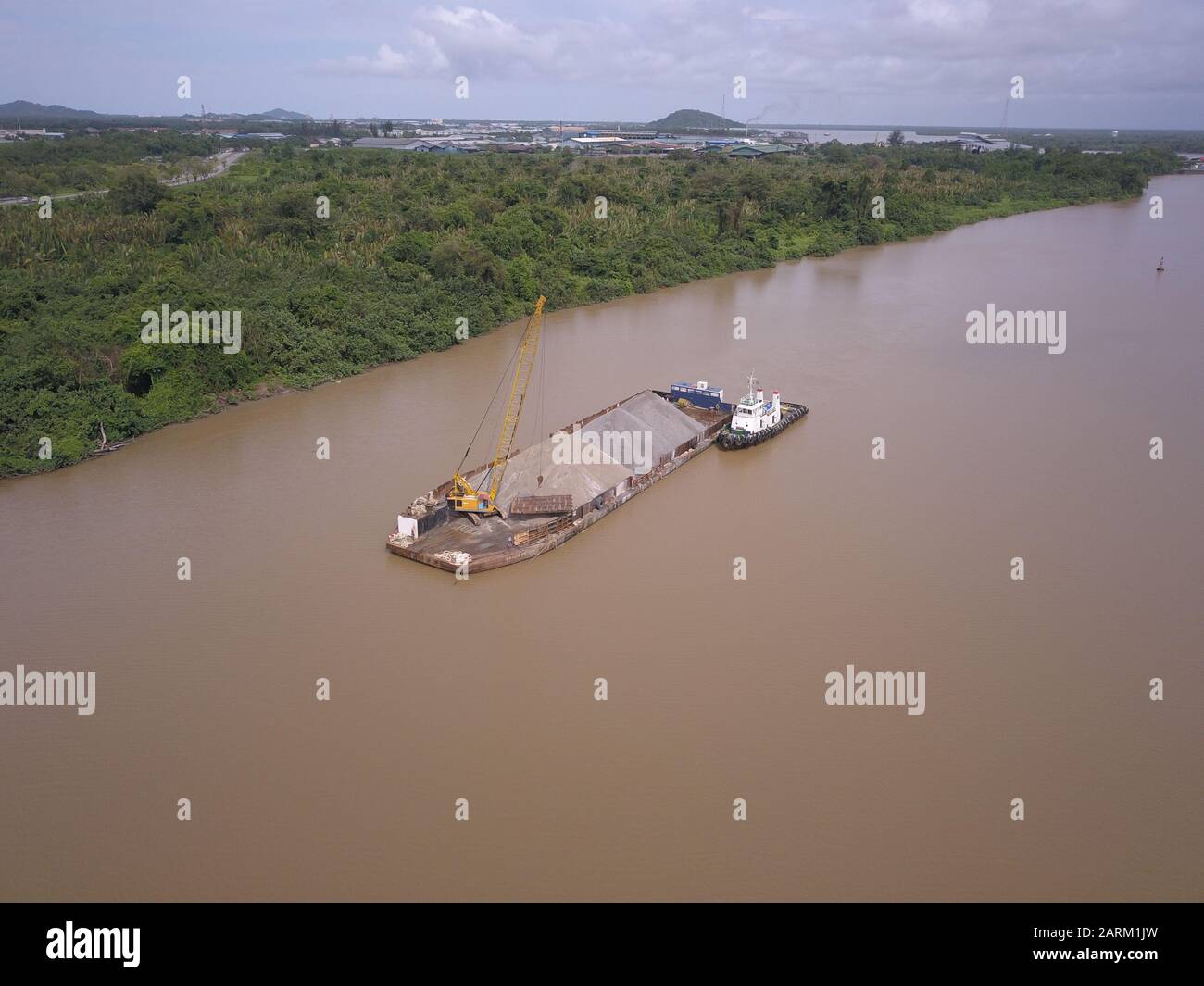 Aerial view of a barrage at the Kuching Isthmus island, with ships ...