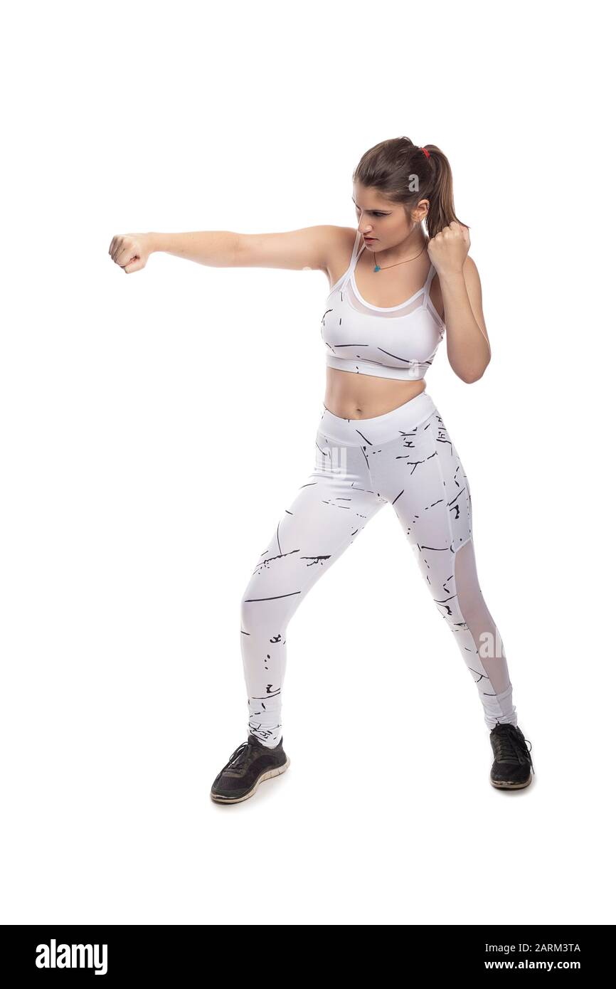 Female boxer practicing kickboxing Cut Out Stock Images & Pictures - Alamy