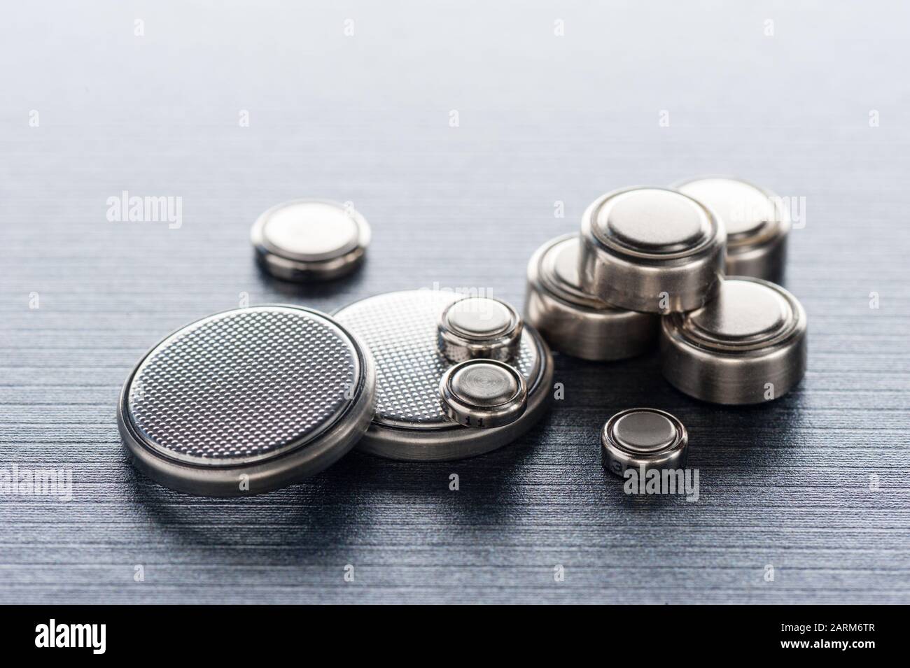 closeup button cell battery or watch battery or coin cell, used to ...