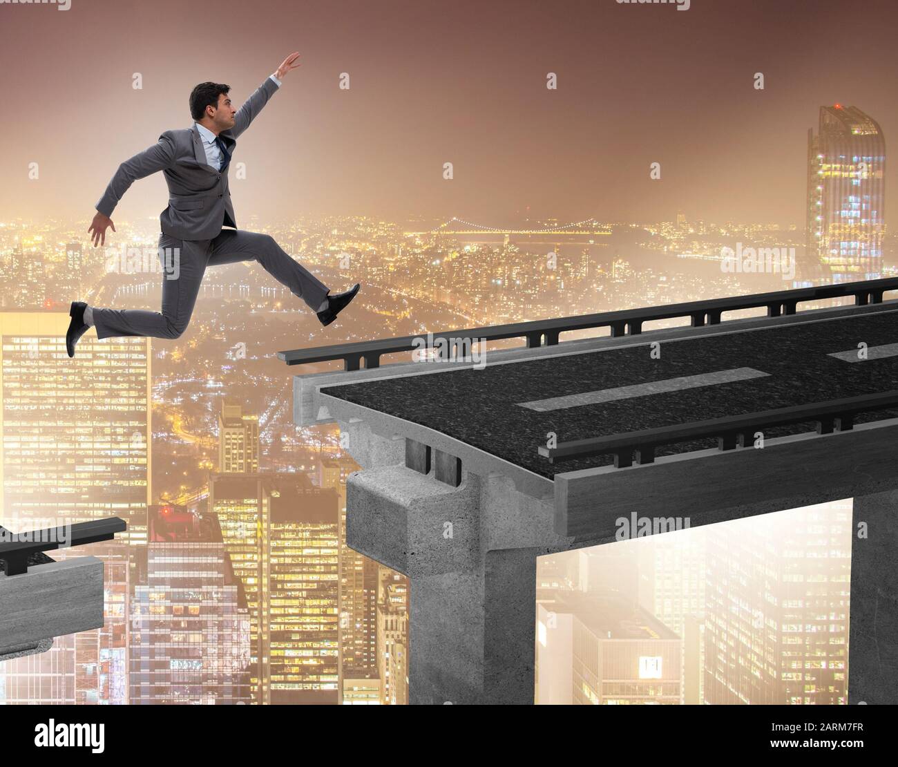 The young businessman jumping over the bridge Stock Photo - Alamy