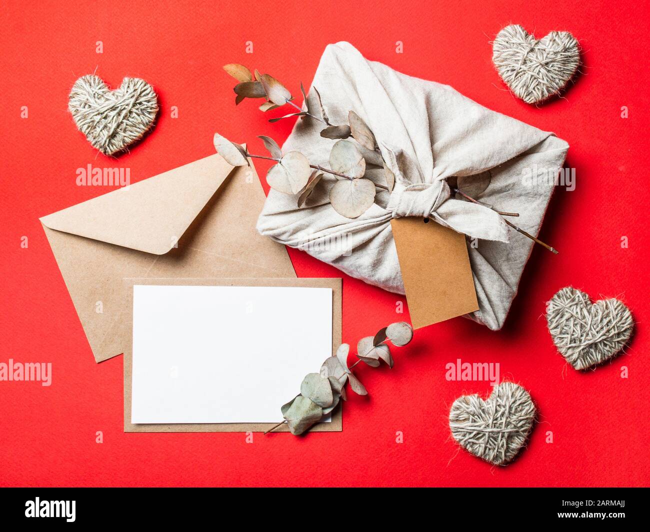 Zero waste Valentine's Day concept and mock up on red. Eco-friendly ...