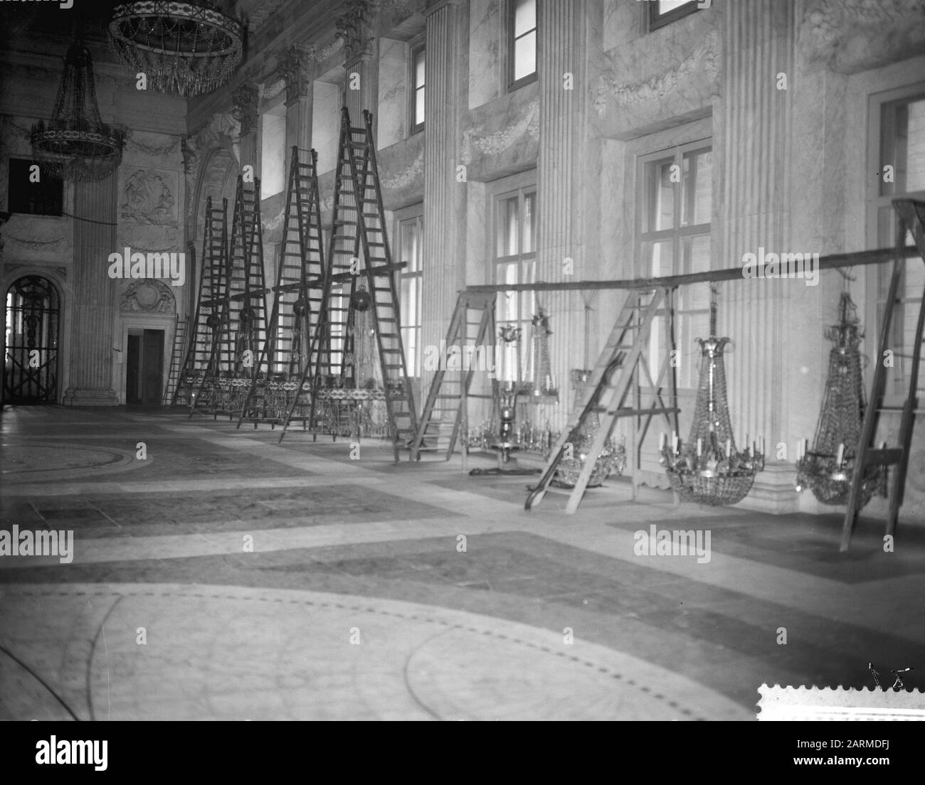 Restoration Royal Palace in Amsterdam, chandelier in the burger hall ...