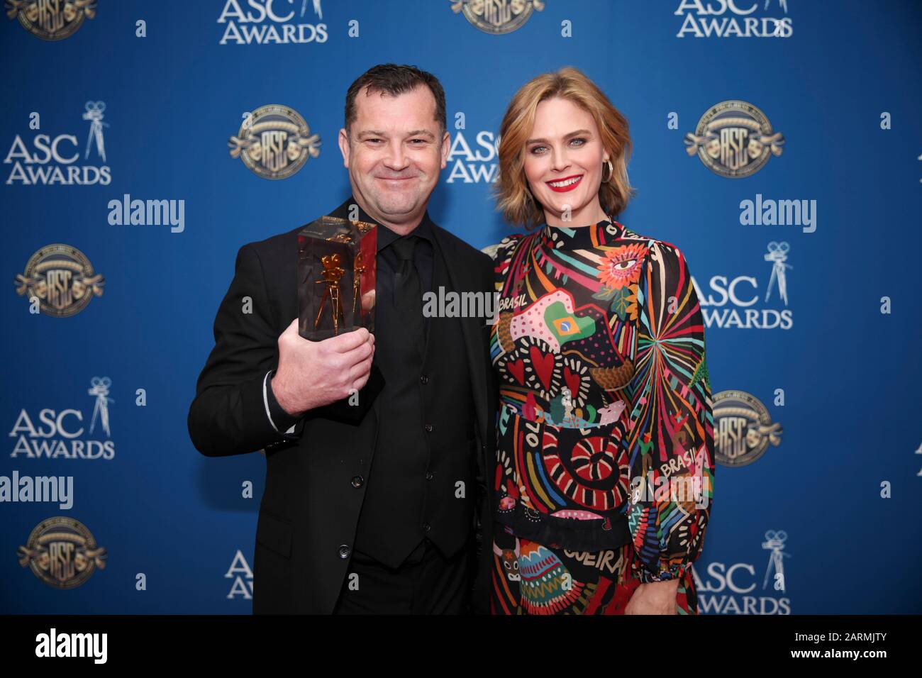 (L-R) Colin Watkinson and actor Emily Deschanel attends the 34th Annual ...