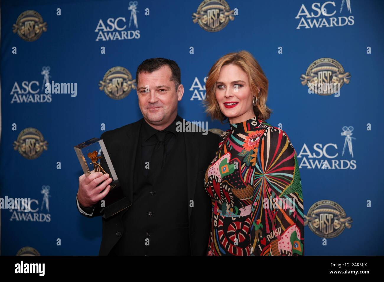 (L-R) Colin Watkinson and actor Emily Deschanel attends the 34th Annual ...