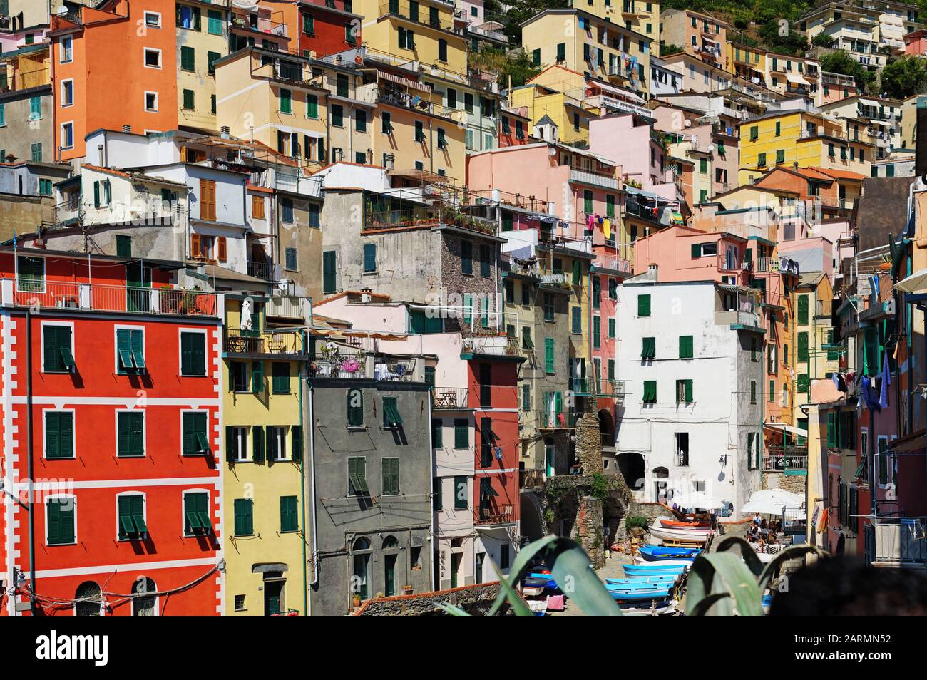 A sea of windows and coloured houses on the hillside of Riomaggiore ...