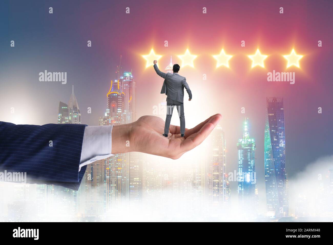 The businessman held on hand reaching out for stars Stock Photo - Alamy