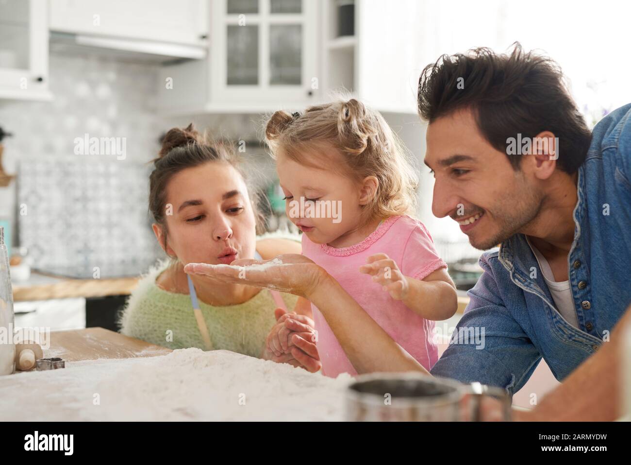 Baking with family can be a great fun Stock Photo - Alamy