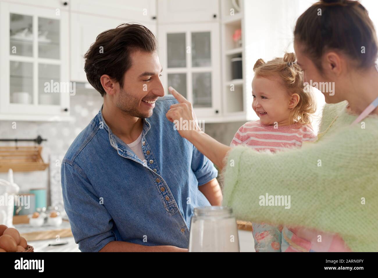 Happy family enjoy cooking together Stock Photo - Alamy