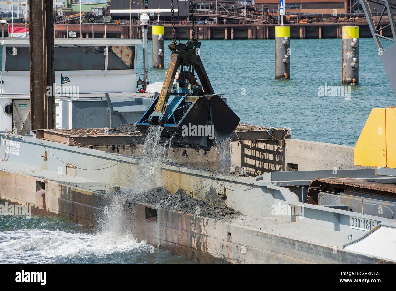 Rotterdam, Netherlands - July 30, 2019; Dredger vessel grabbing harbor ...