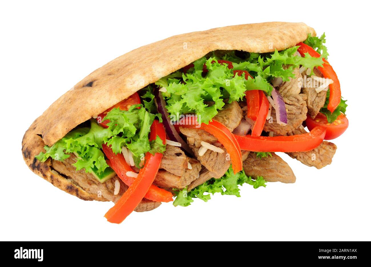 Beef and salad filled wholemeal pitta bread isolated on a white ...
