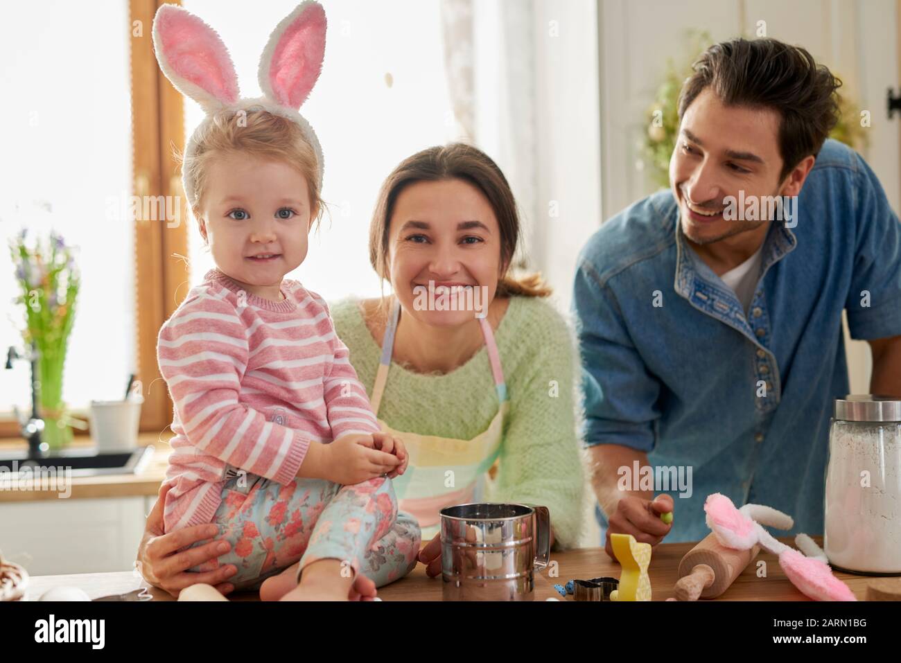 Happy family in Easter time Stock Photo - Alamy