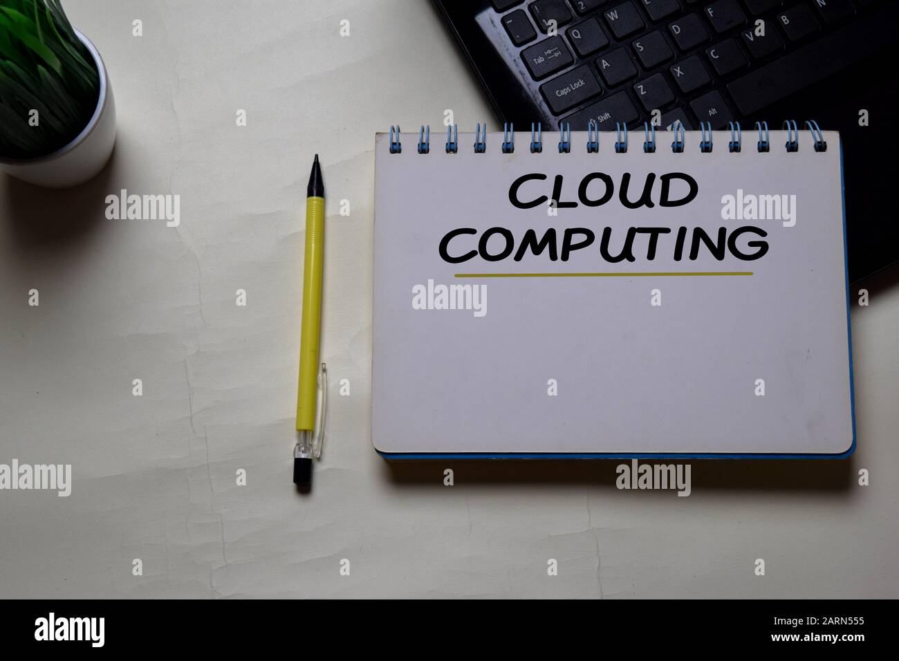 Cloud Computing write on a book isolated on office desk Stock Photo - Alamy