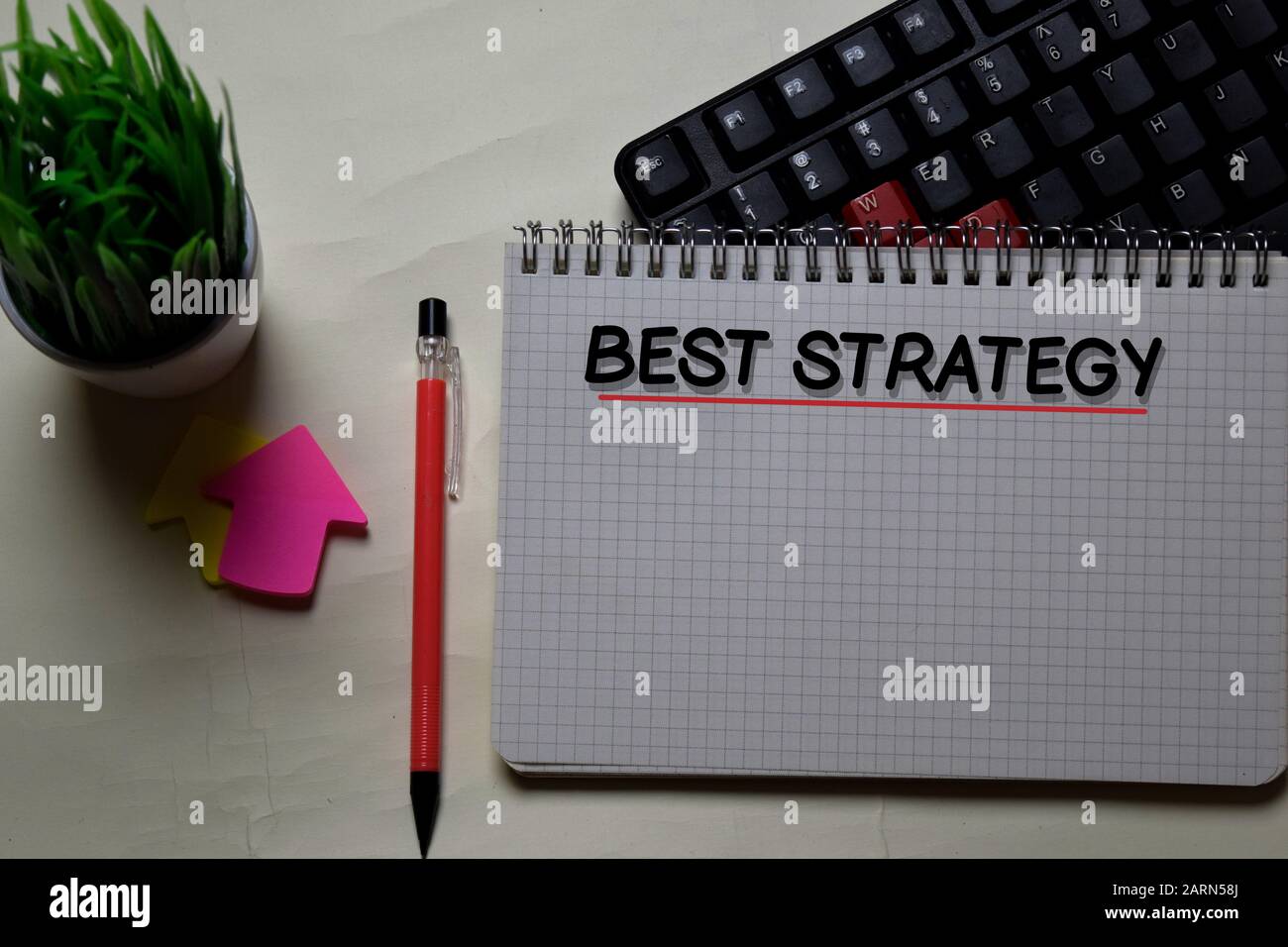 Best Strategy write on a book isolated on office desk Stock Photo - Alamy