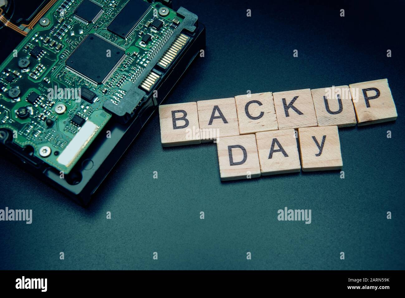 hard disk on black dark background with selective focus and crop ...