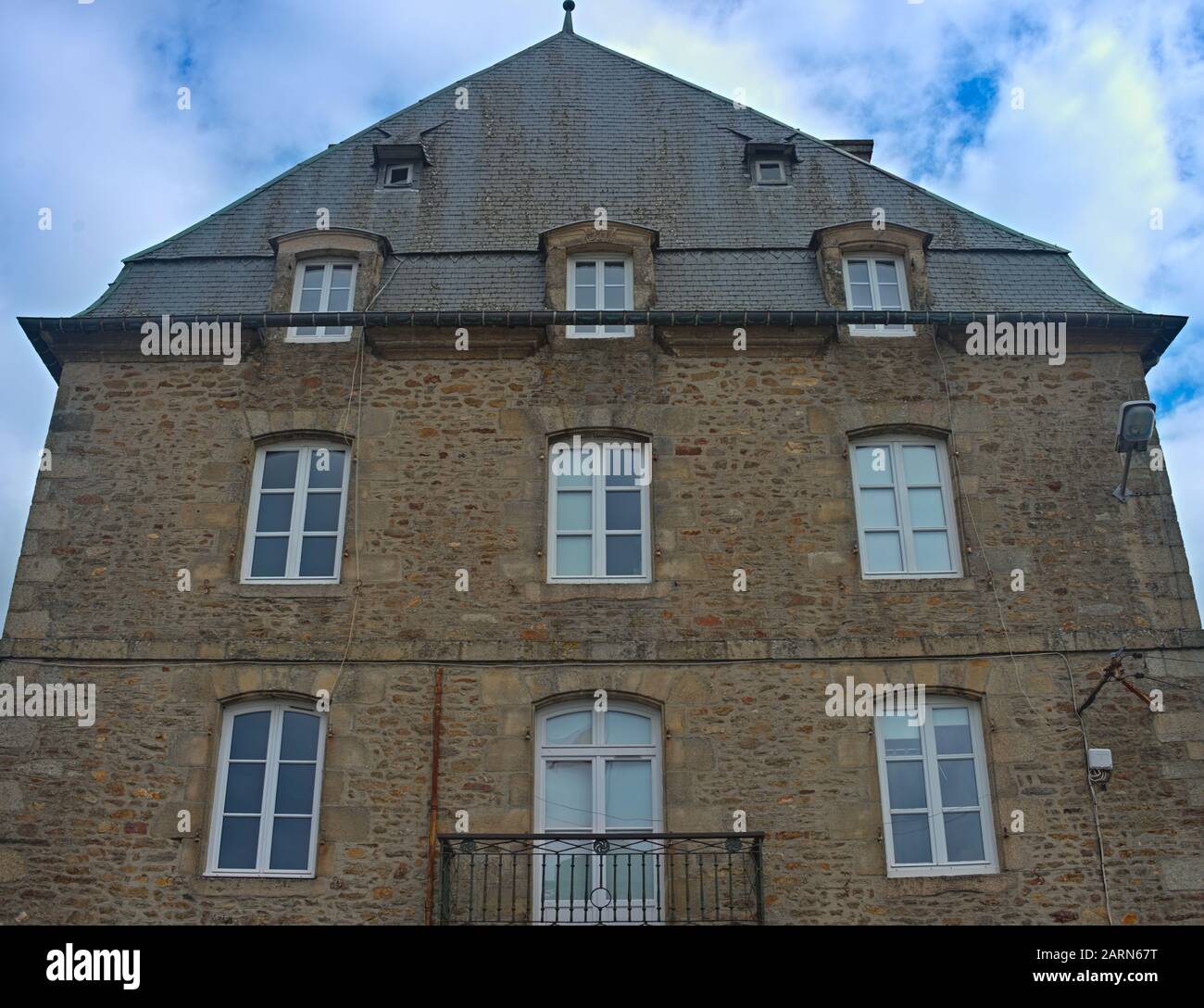Traditional french stone building with many windows Stock Photo - Alamy