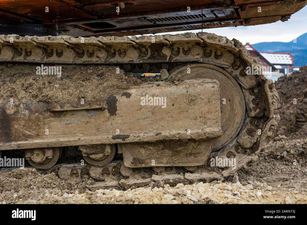 Tracks of a excavator machine on a construction site Stock Photo - Alamy