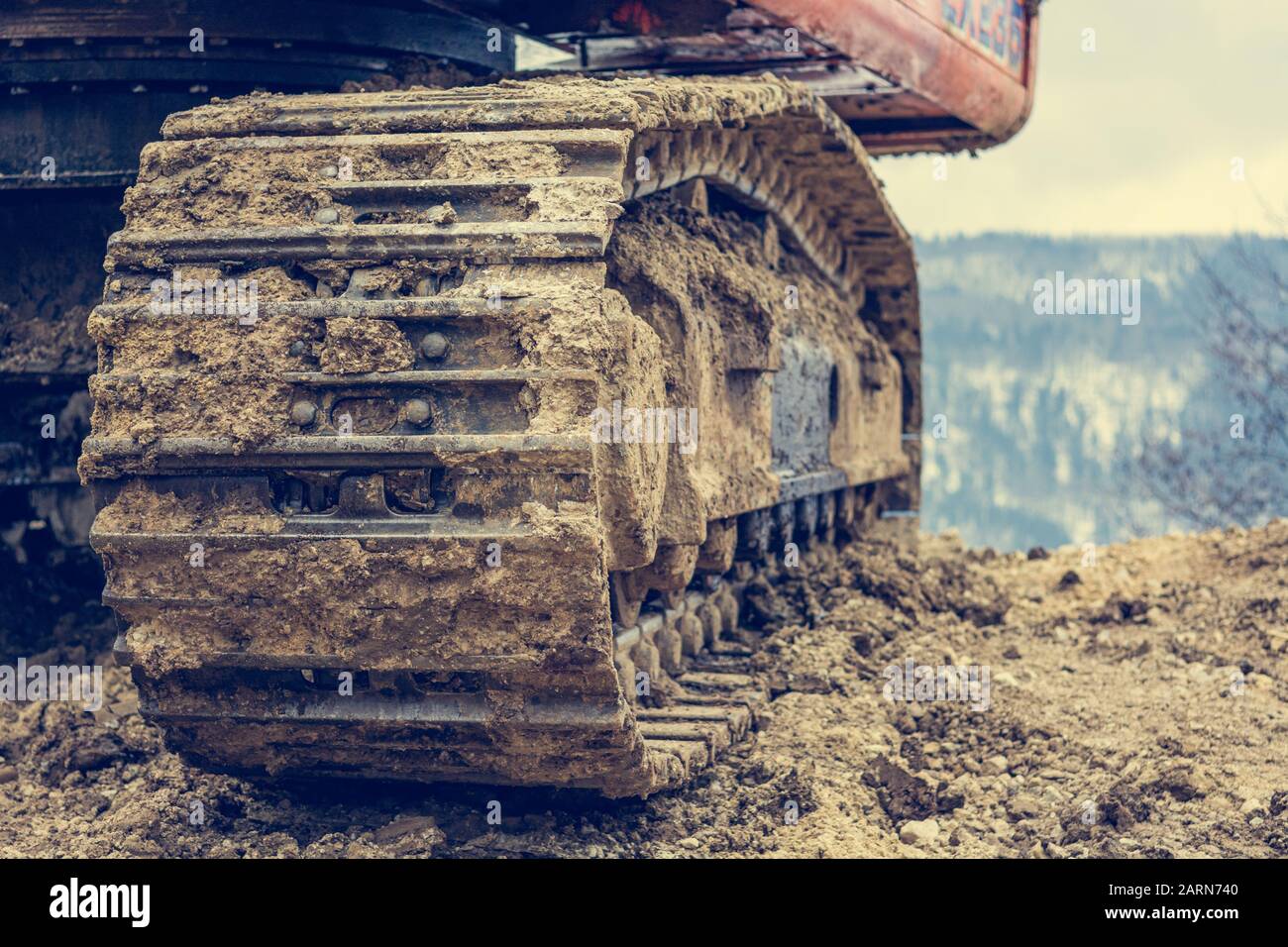 Tracks of a excavator machine on a construction site Stock Photo - Alamy