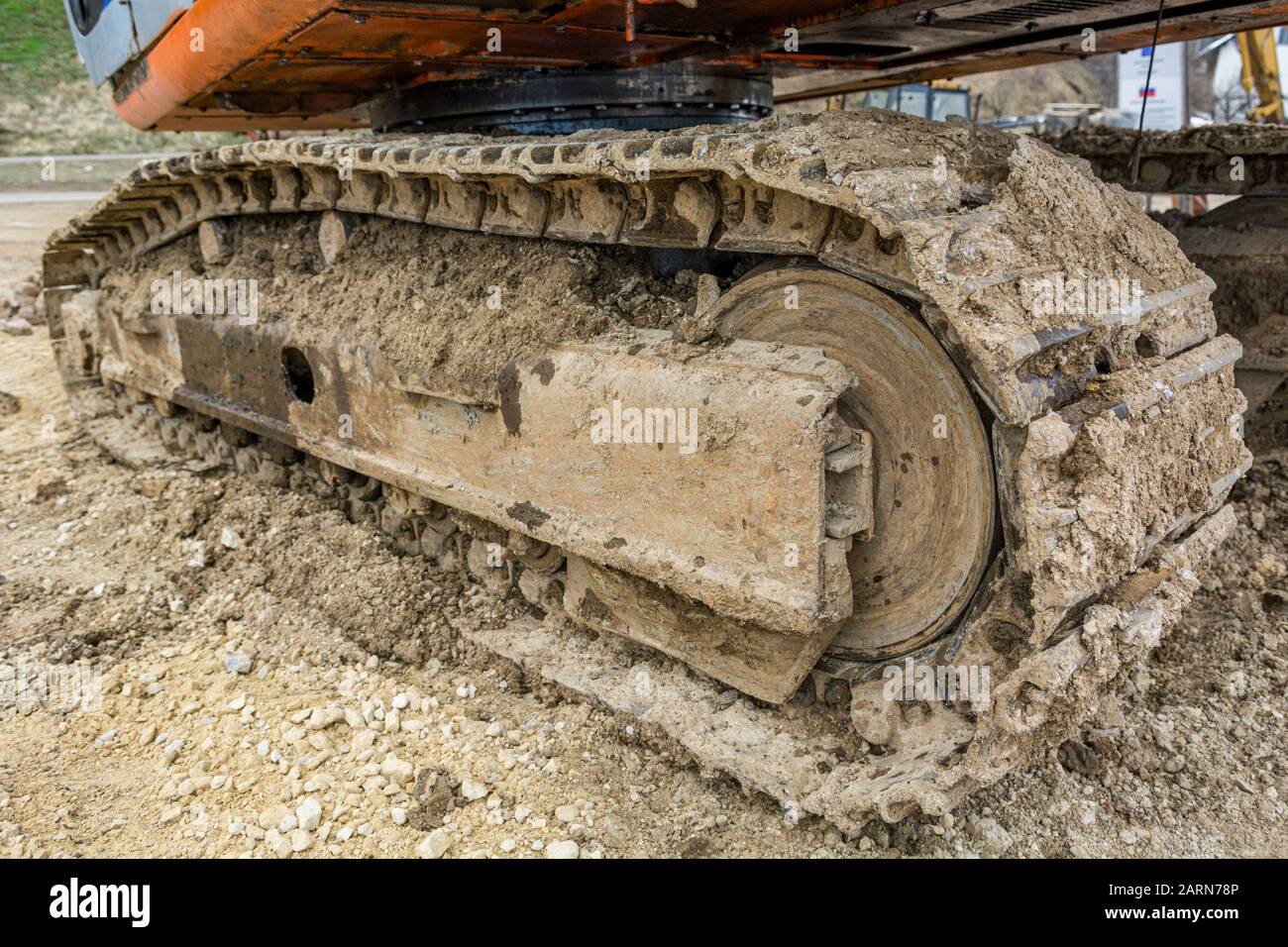 Tracks of a excavator machine on a construction site Stock Photo - Alamy