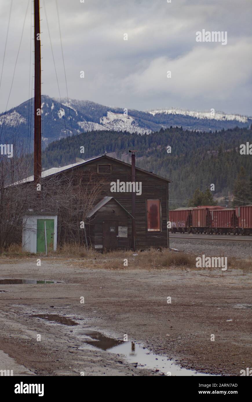 A disused old, wooden railroad building at the BNSF Railroad yard, in ...