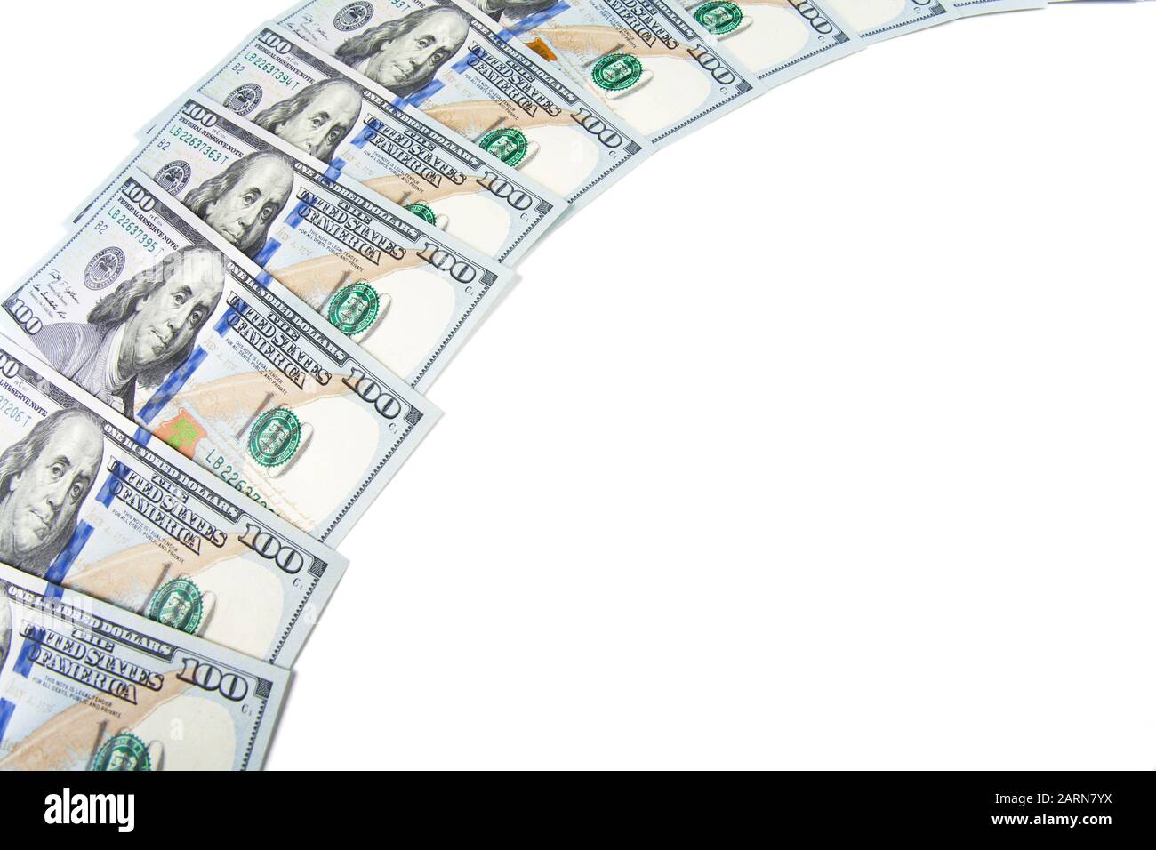 Banknotes of dollars are stacked in a row. Isolated white background ...