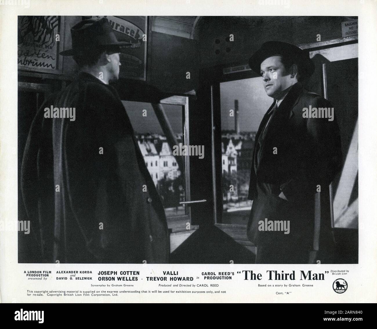 JOSEPH COTTEN as Holly Martins and ORSON WELLES as Harry Lime in THE ...