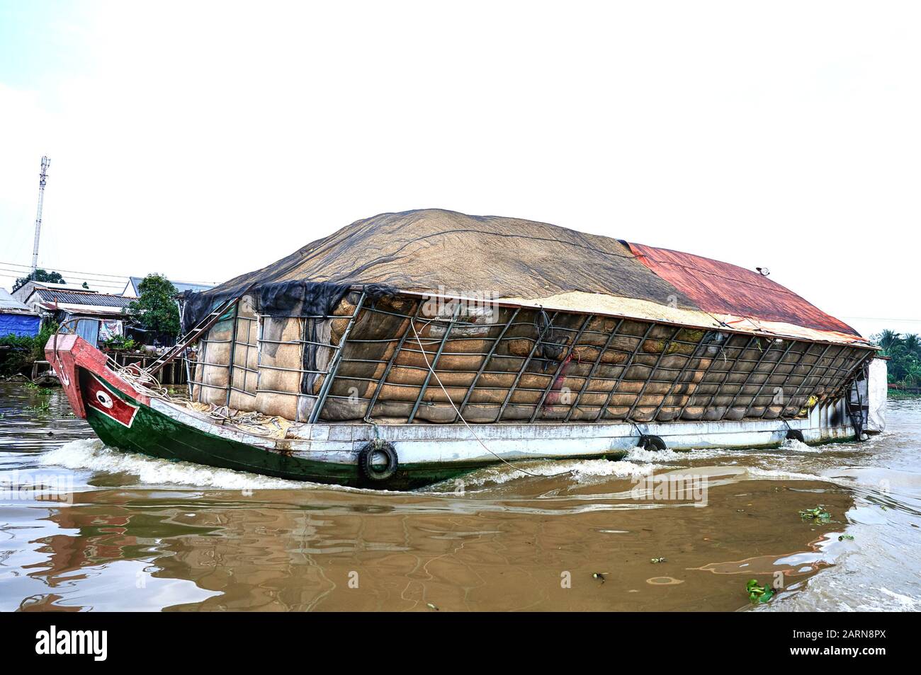 Heavily loaded river freight on the Mekong River Stock Photo - Alamy