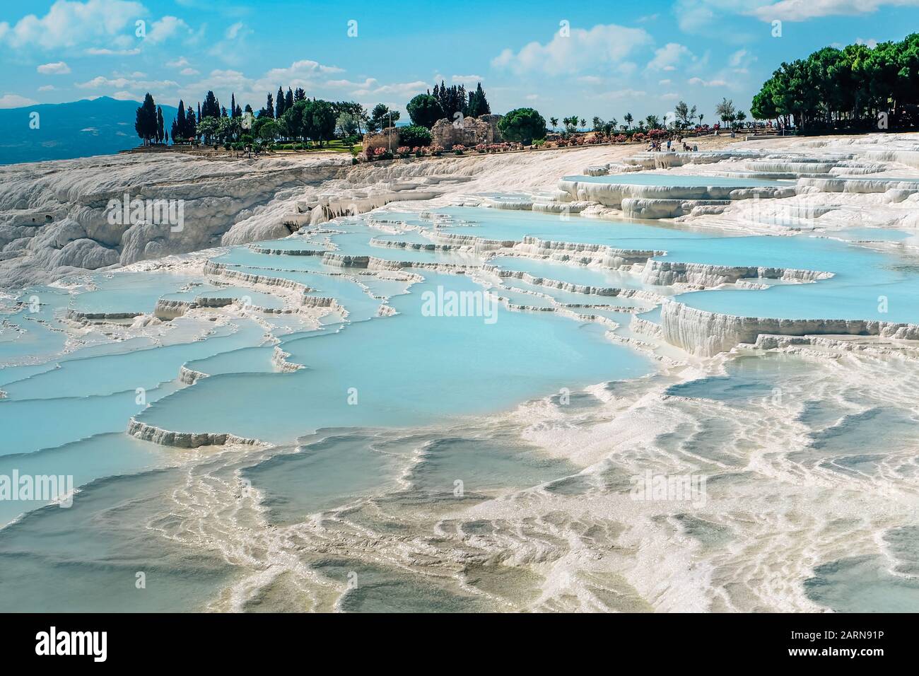 Natural travertine pools and terraces in Pamukkale Turkey Stock Photo ...